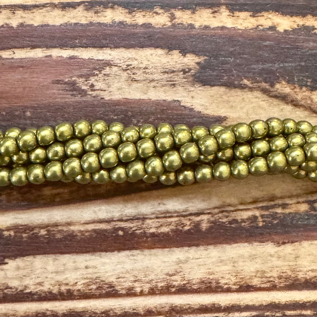 5-04-05A03 - Czech Round Pressed Beads, Saturated Metallic Meadowlark ...